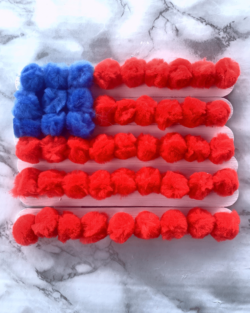 Patriotic Pom Pom Flag Craft - This Tiny Blue House