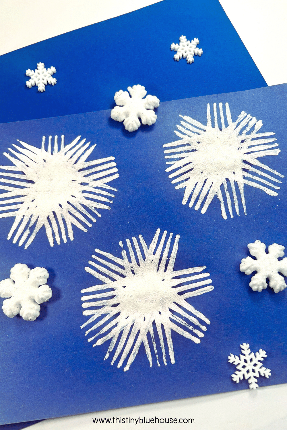 Fork Painted Snowflakes Craft - This Tiny Blue House