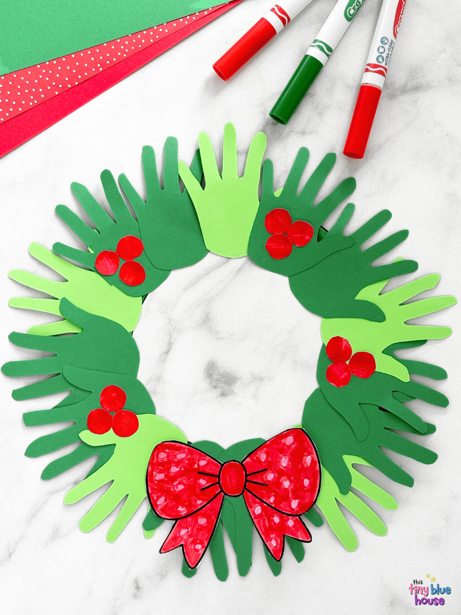 Christmas Handprint Wreath Craft (Free Printable Template) - This Tiny ...