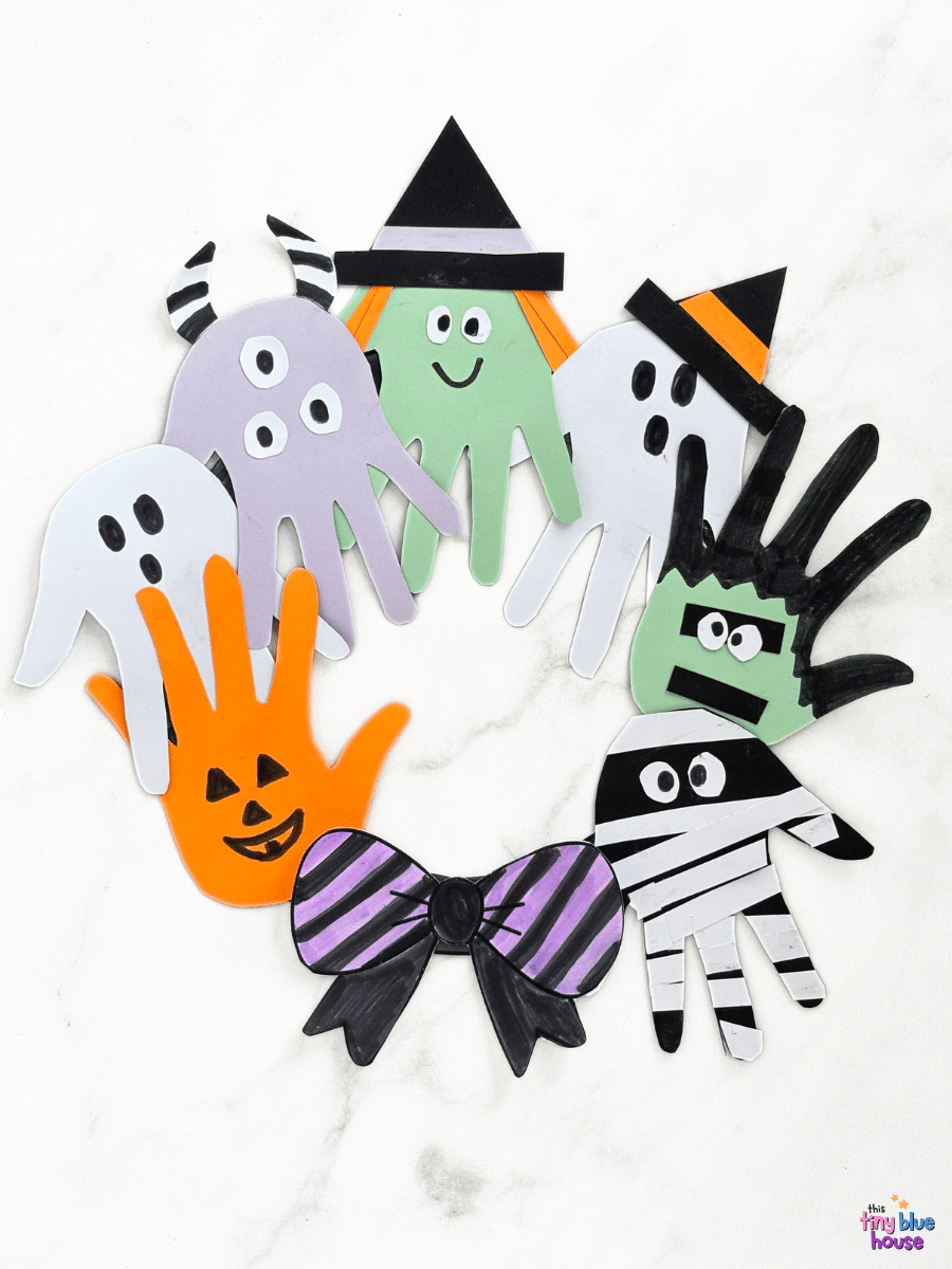 Halloween Handprint Wreath Craft (Free Template) - This Tiny Blue House
