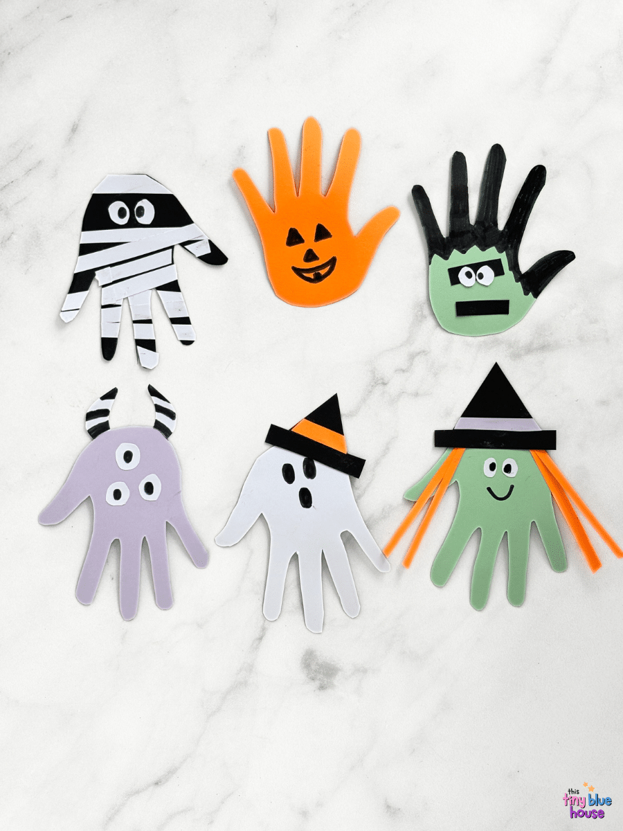 Halloween Handprint Wreath Craft (Free Template) - This Tiny Blue House